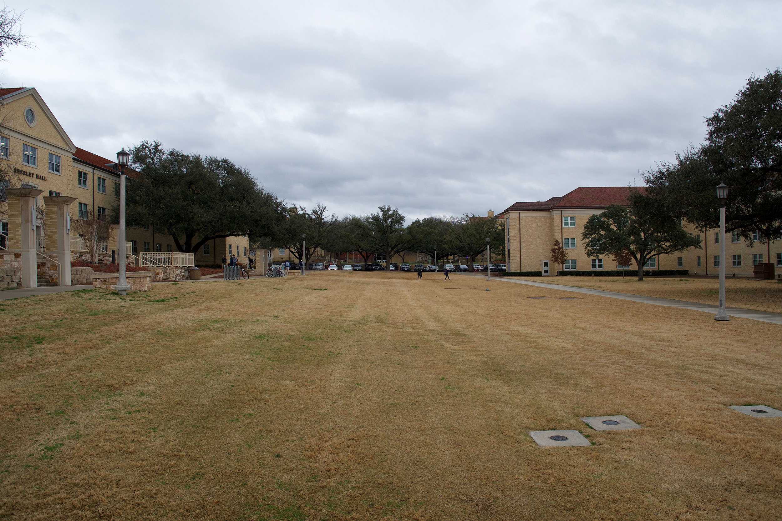 Students working to build outdoor basketball court on campus | TCU 360